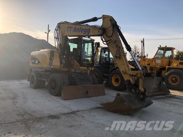 Cat M 315 D, 2008, Poznań, 폴란드 - 익숙한 휠 굴삭기 - Mascus Korea