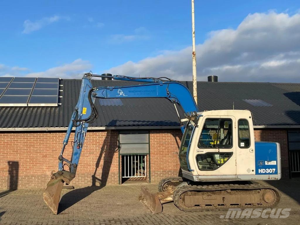 Kato HD307 Graafmachine, 2004, Lunteren, Niederlande - Mascus Niederlande