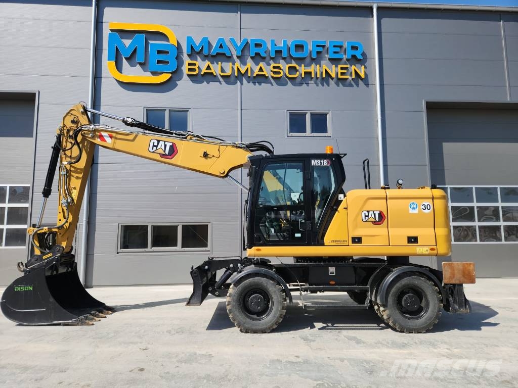 Cat M 318, 2023, Neumarkt, Salzburg, Austria - Used wheeled excavators ...