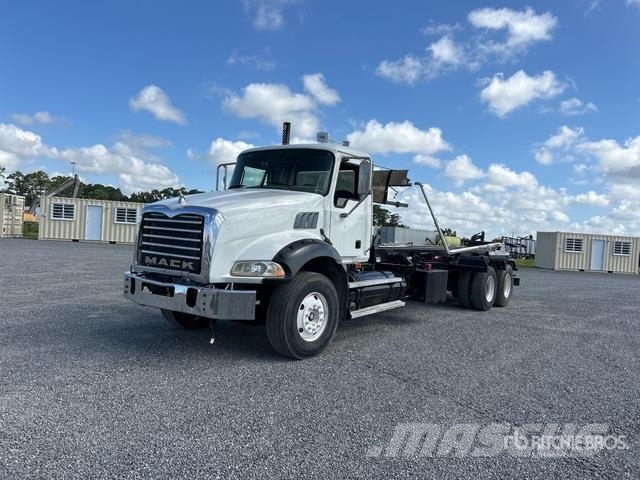 Purchase Mack GU813 skip loader trucks, Bid & Buy on Auction - Mascus USA