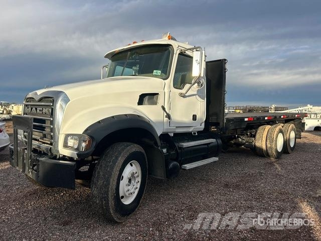 Purchase Mack GU700 flatbed / Dropside, Bid & Buy on Auction - Mascus