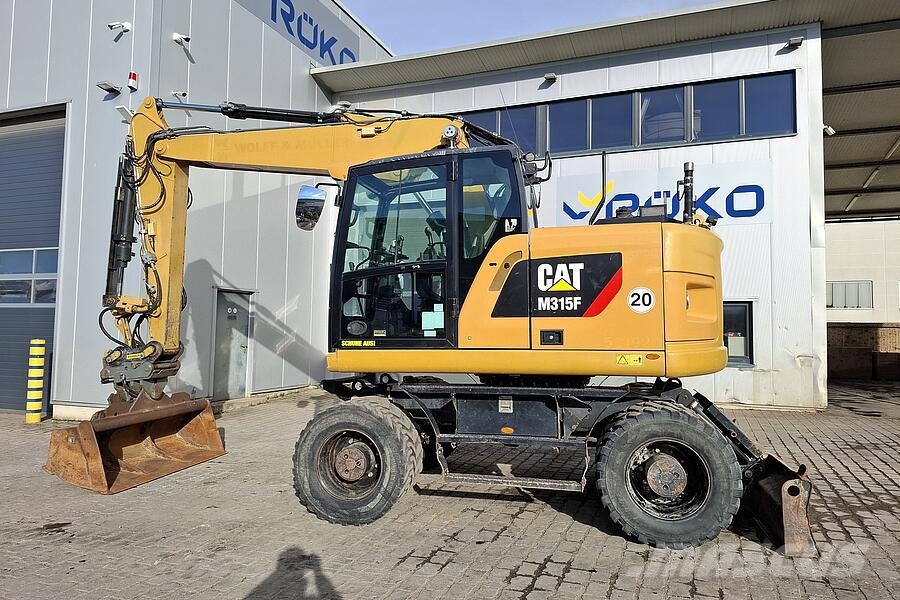 Cat M 315 F, 2018, 76316 Malsch, Germany - Used wheeled excavators ...